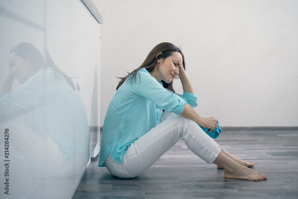 Girl Sitting Down Crying