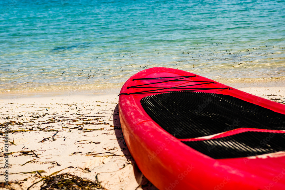 Red kayak on the shores of Coco Cay Island in the Bahamas. Luxury beach ...