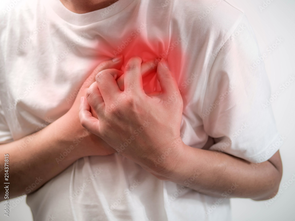 Heart attack concept. Man suffering from chest pain on white background ...