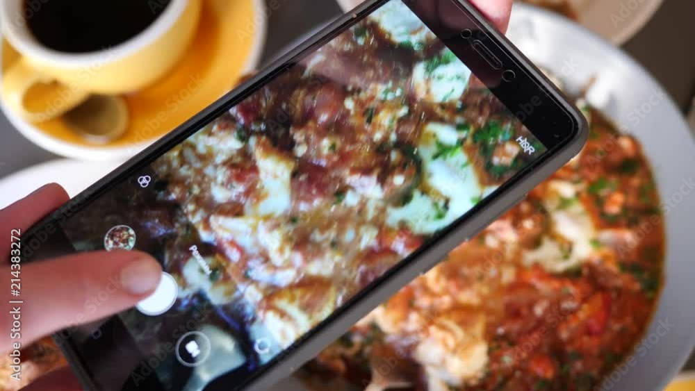 Girl take mobile phone picture of breakfast - a food photo for social ...