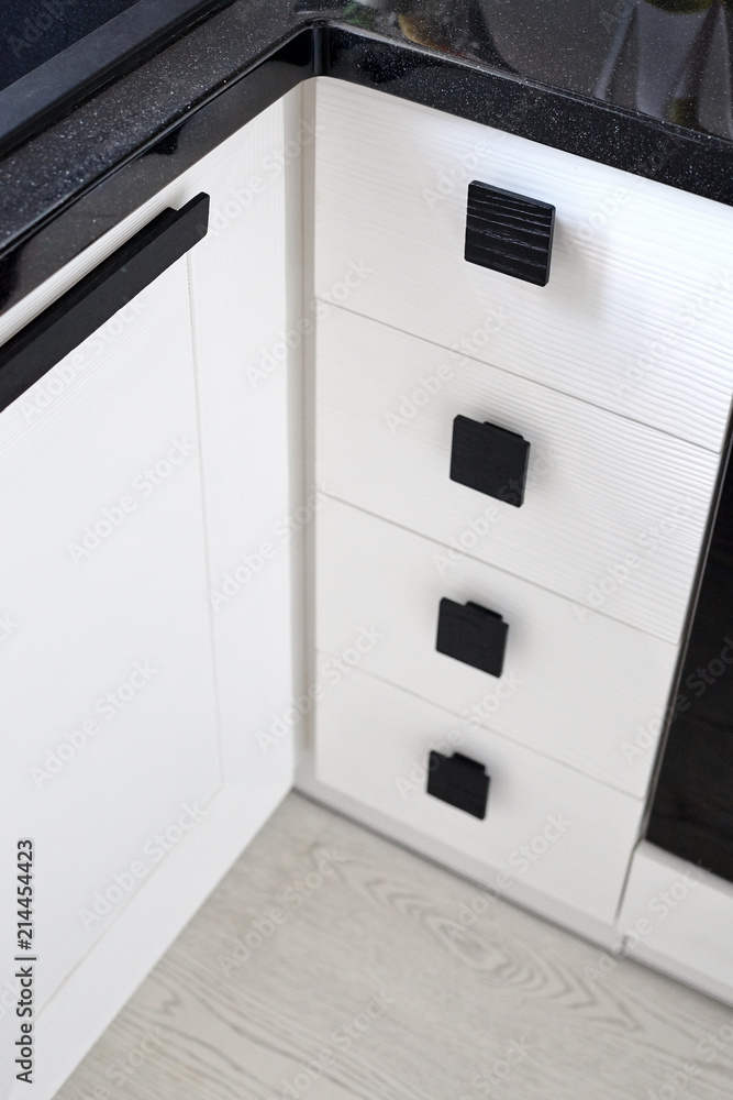 Solution for a kitchen corner storage in a cupboard. A corner unit with ...