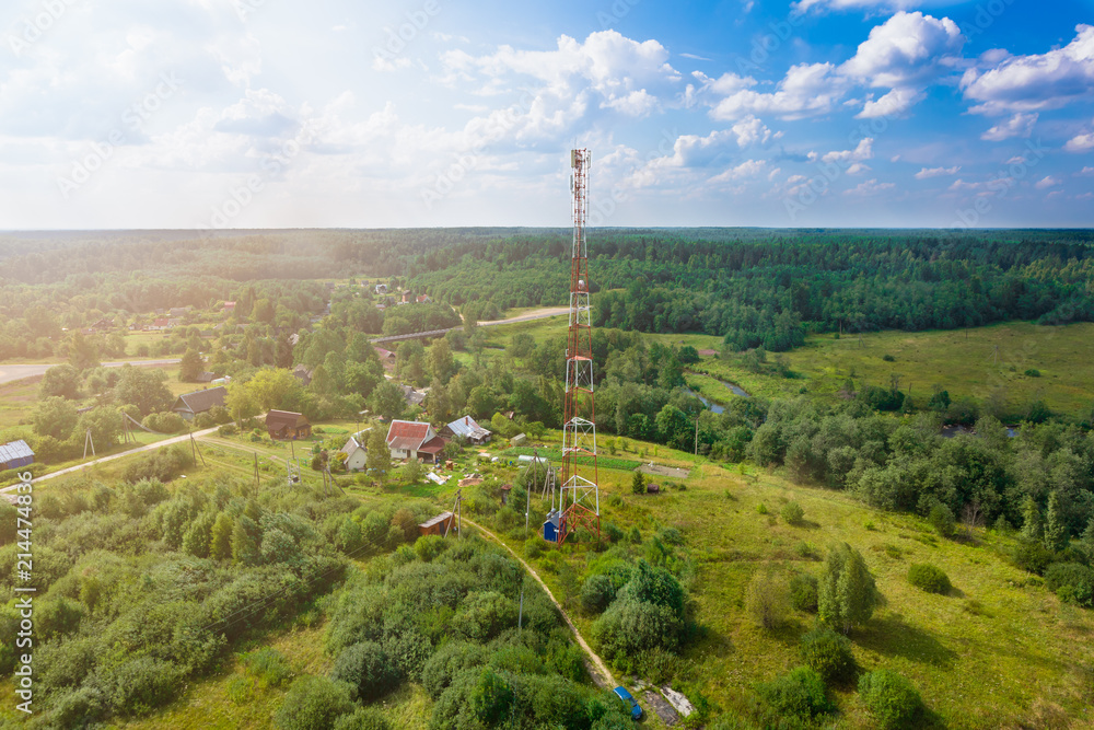 Telecommunication tower with radio antennas and satellite dishes is ...