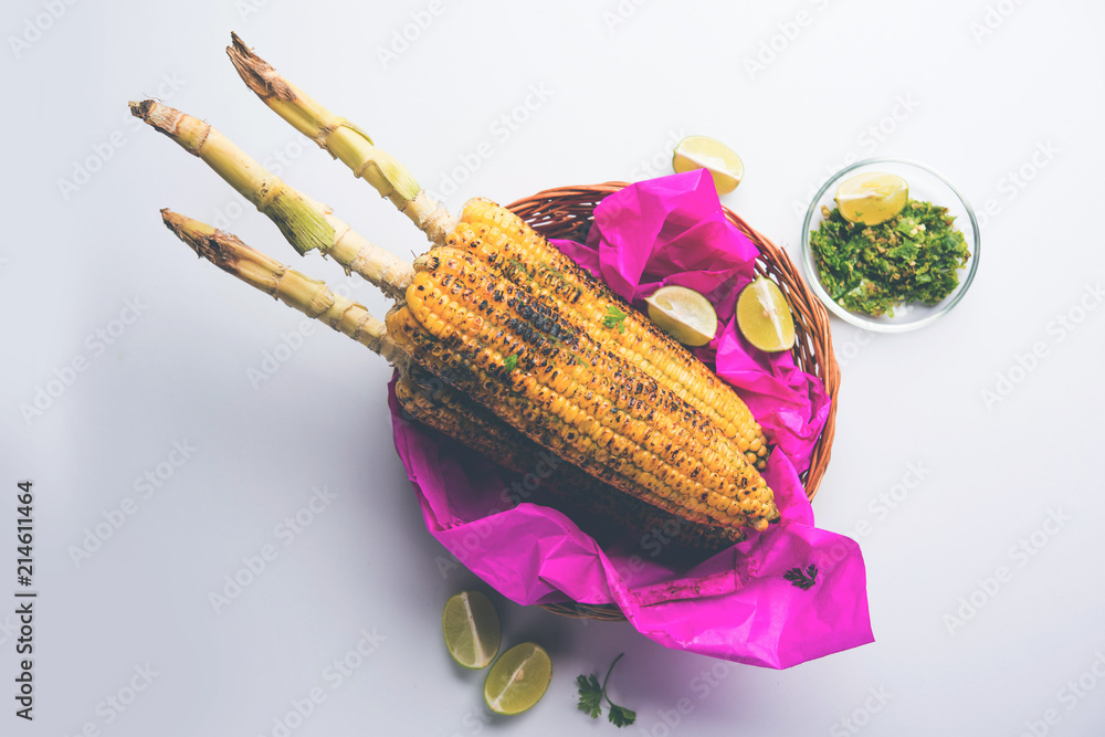 Delicious Indian street corn cob also called Bhutta, flavoured with ...