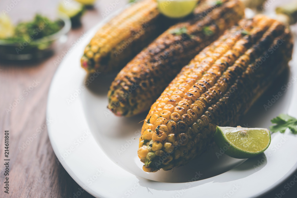 Delicious Indian street corn cob also called Bhutta, flavoured with ...