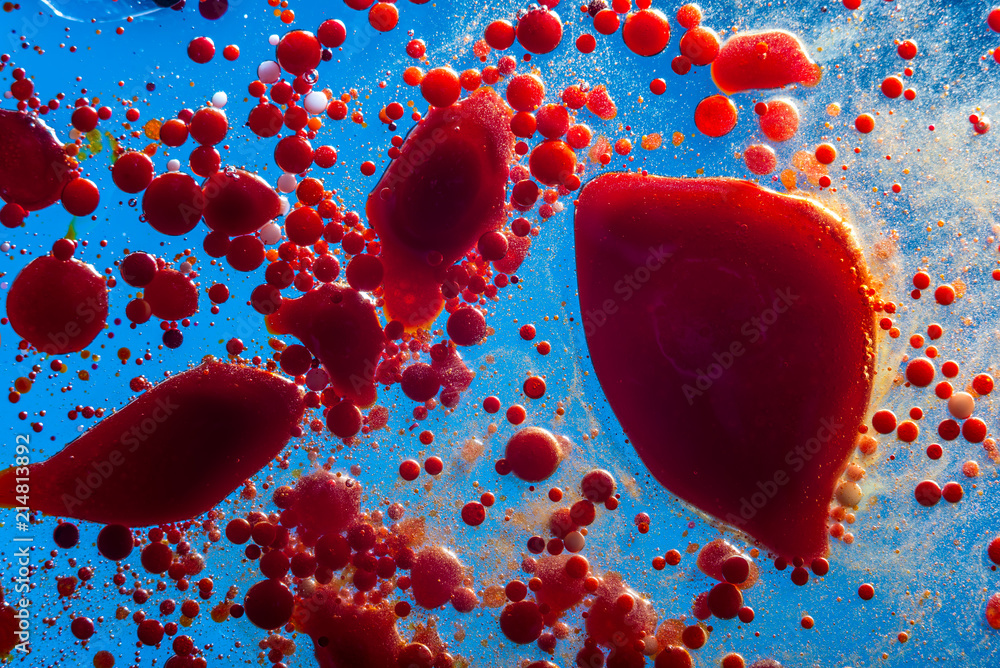 Red bubbles of blood cells on blue background. Abstraction of medicine ...
