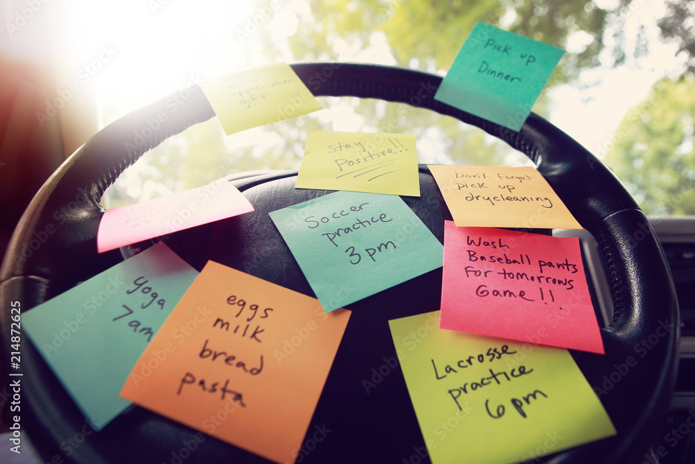 Steering wheel covered in notes as a reminder of errands to do Stock ...