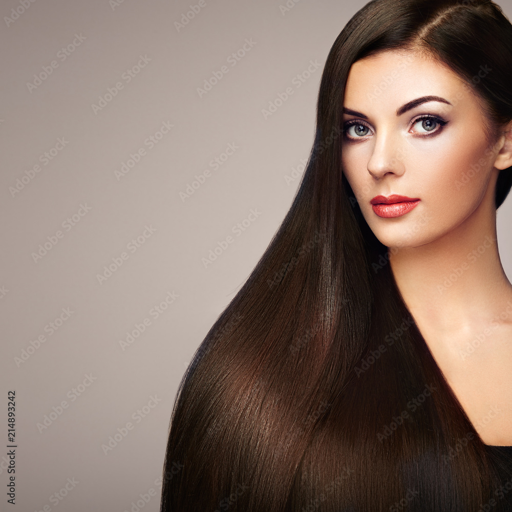 Beautiful woman with long smooth hair. Girl with perfect makeup and ...