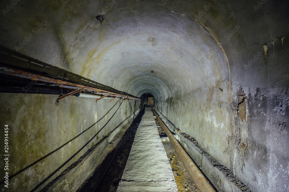 Underground technical tunnel with cable lines an pipeline of heating ...