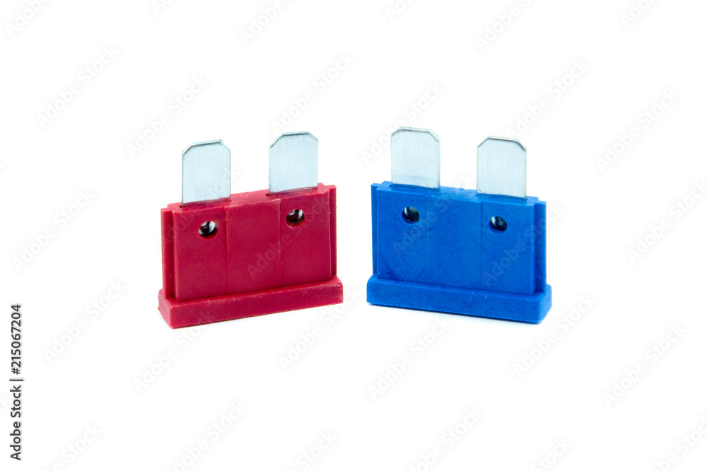 Two car fuses, red and blue colors. To repair the electrical circuit in ...