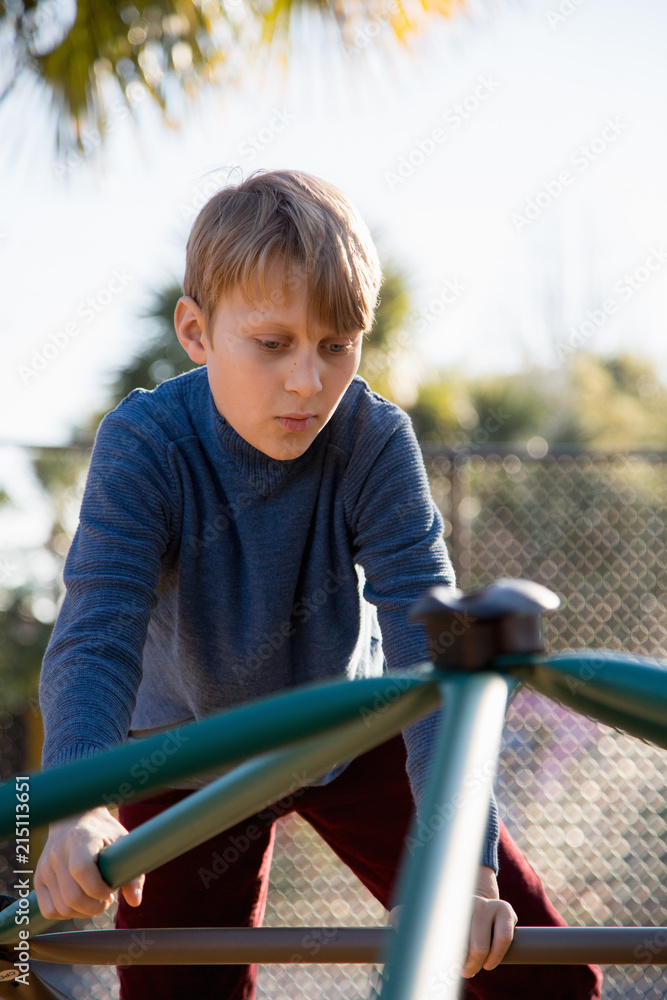 A boy playing during recess at school Stock Photo | Adobe Stock