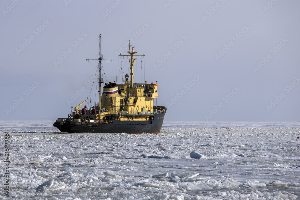 Icebreaker ship breaks ice and moves across the frozen sea Stock Photo ...
