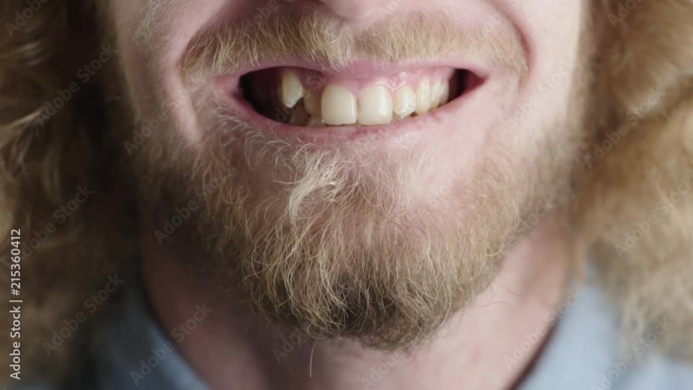 close up young man mouth smiling happy caucasian male with beard half ...