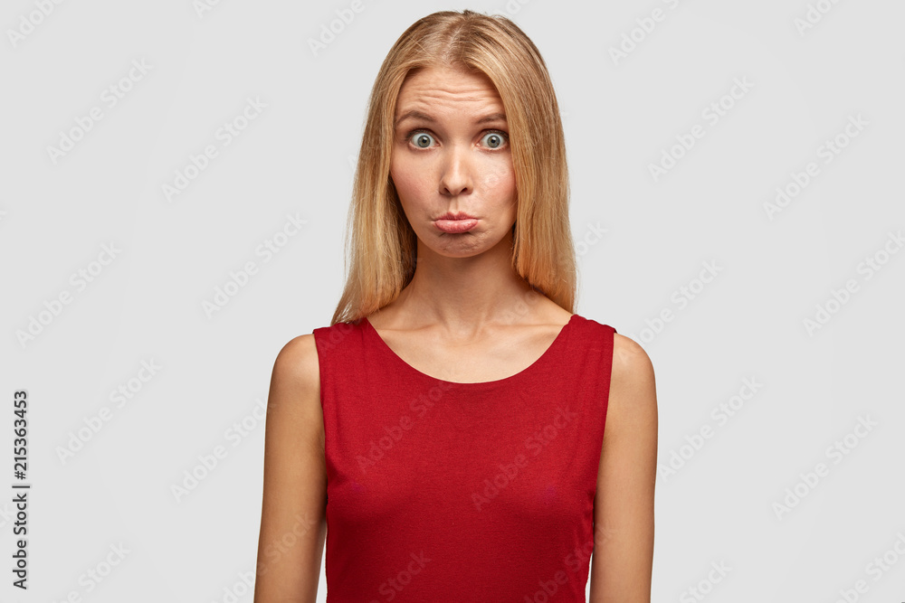 Shot of surprised offended female doesn`t expect to be insulted by ...