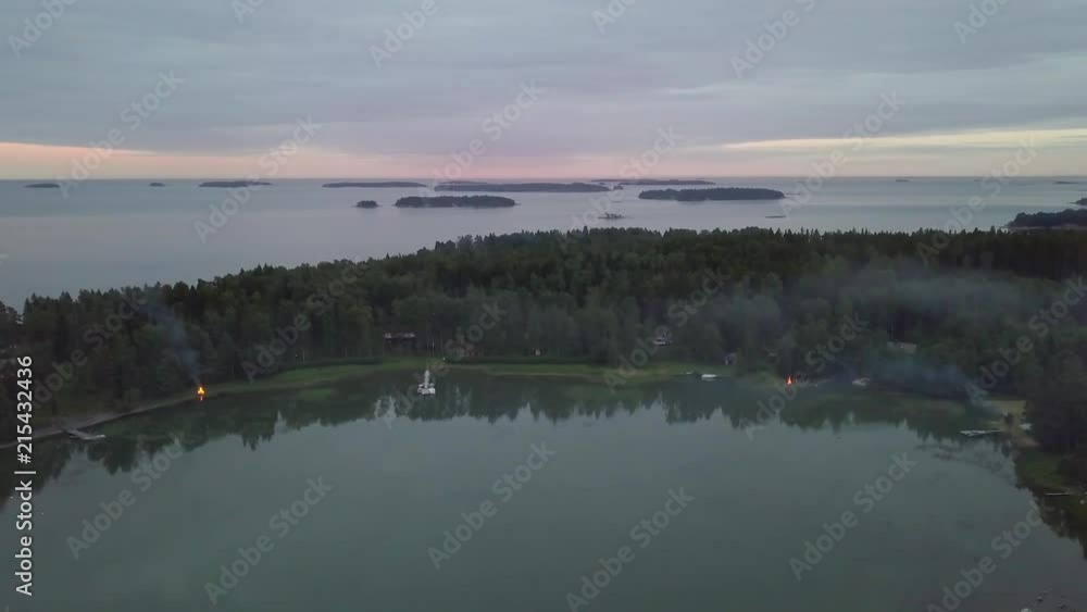 Burning bonfires to celebrate midsummer, the celebration of the longest ...