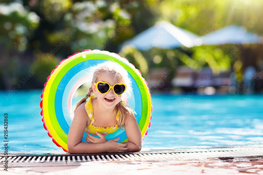 Child in swimming pool. Kids swim. Water play. Stock Photo | Adobe Stock