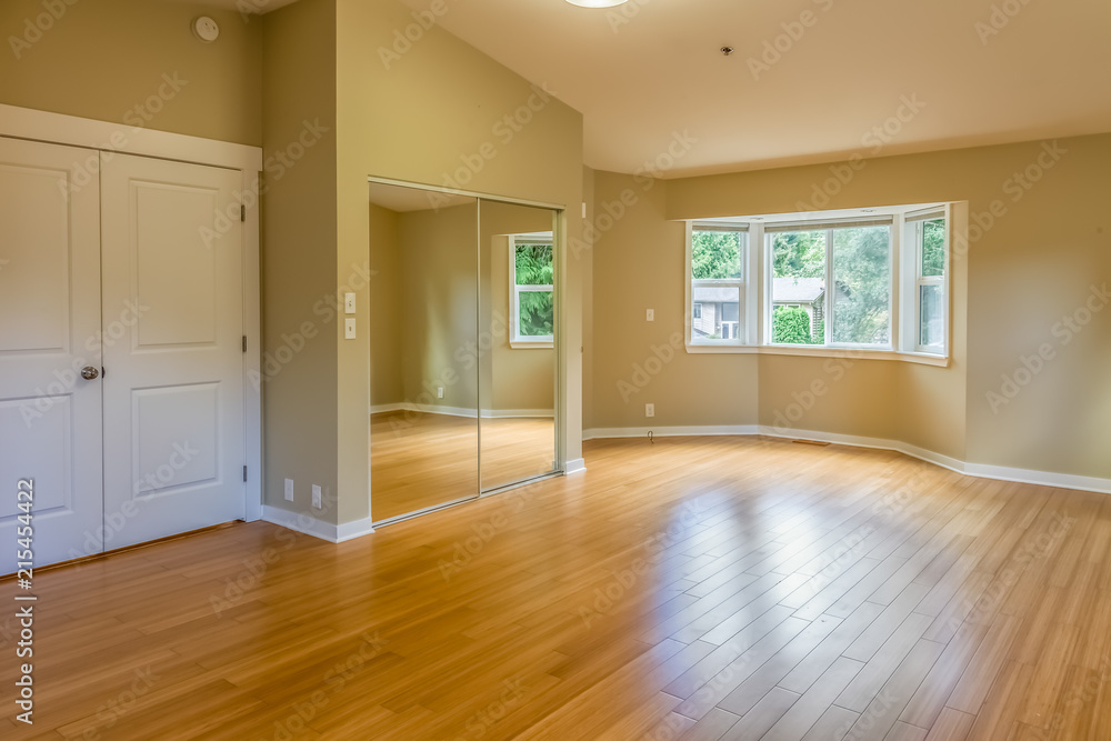 Empty Master Bedroom With Bed