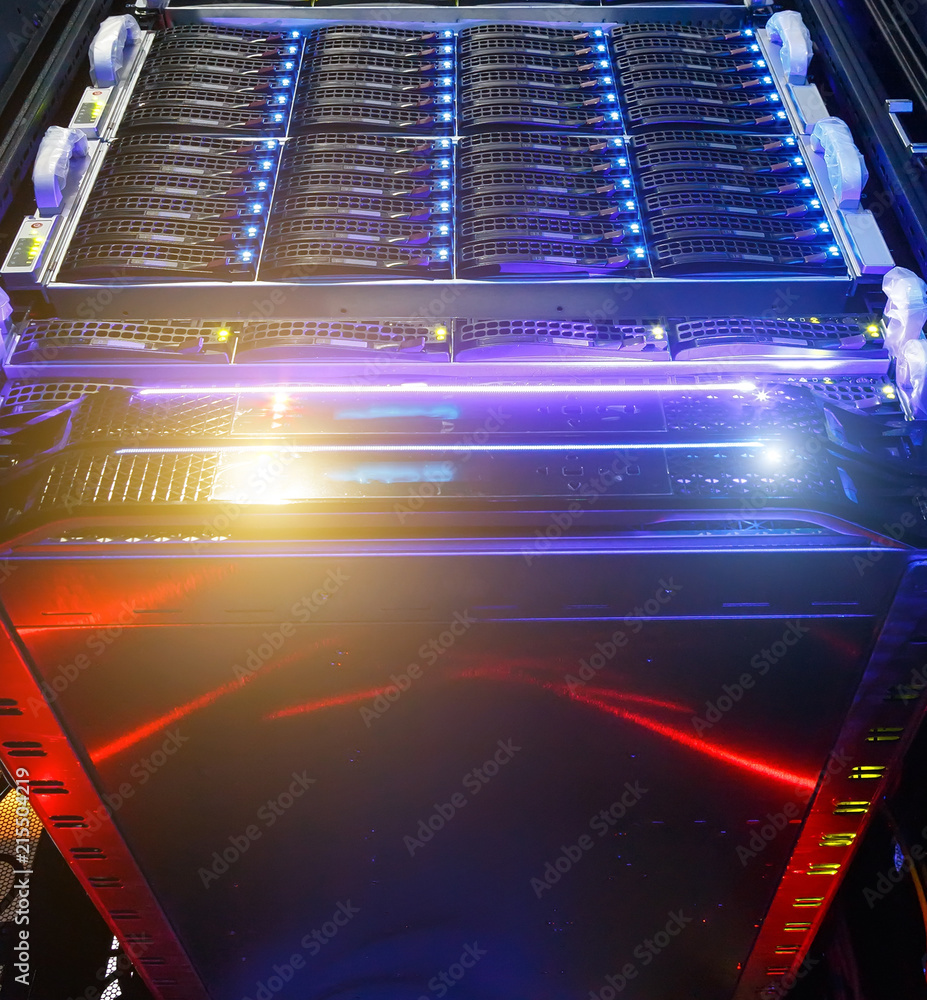 Computer Server mount on rack in data center room with red lighting ...