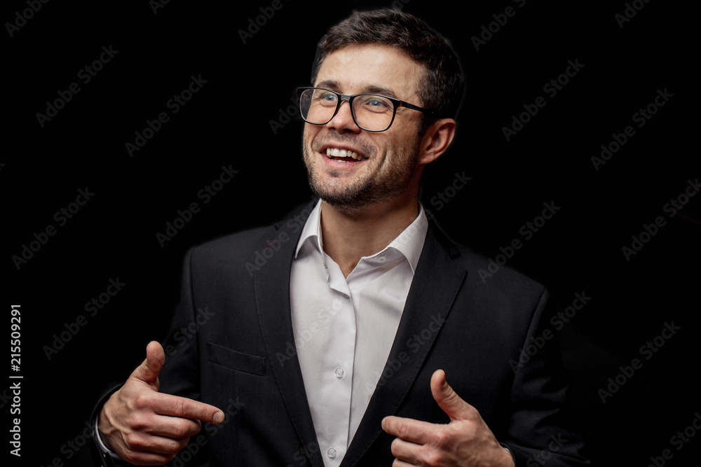 show man in elegant fashion suit is talking with audience. effective ...