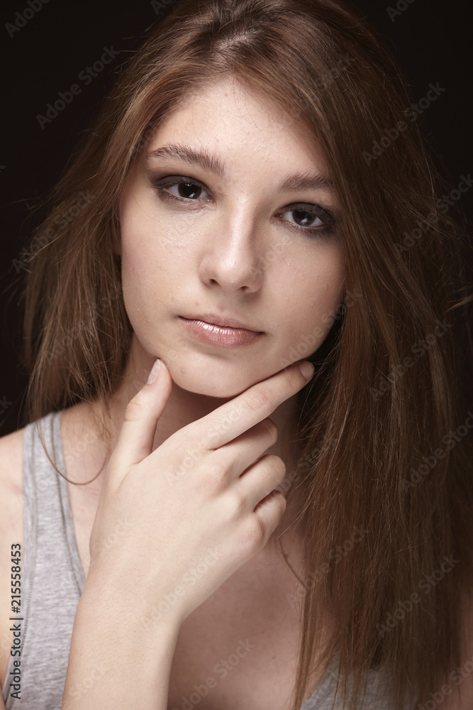 one young teenage girl, close up portrait, head and shoulders shot ...