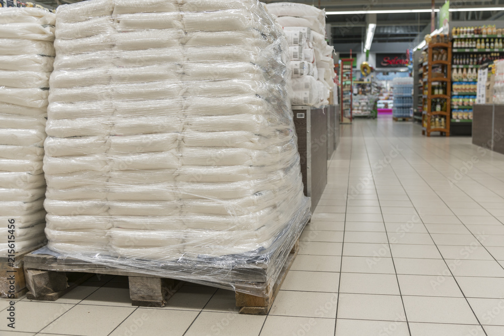 Sacks of flour in the supermarket. Warehouse with provisions Stock ...