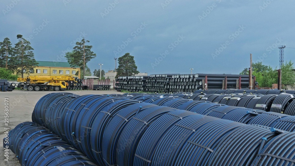 Warehouse of finished plastic pipes industrial outdoors storage site ...