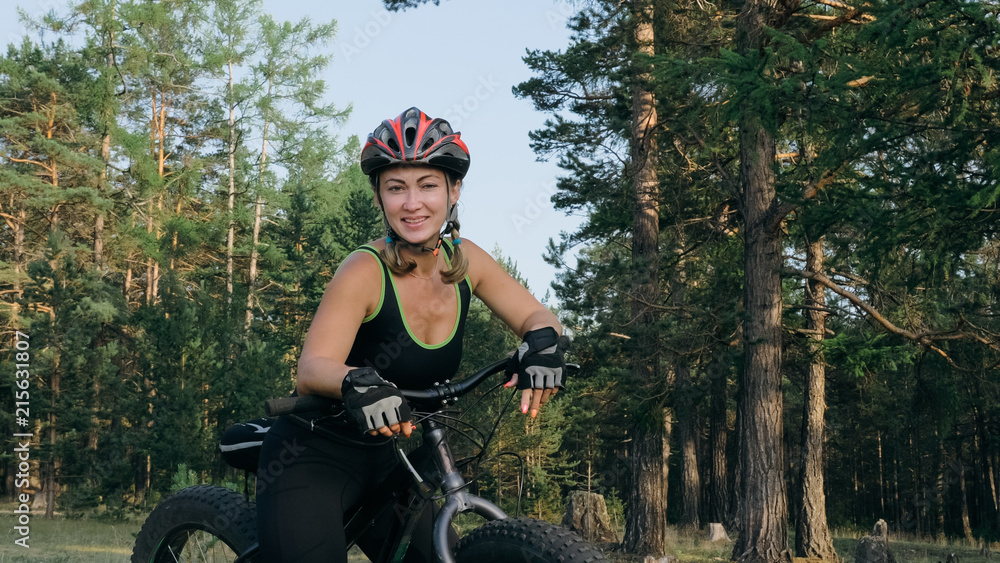 Fat bike also called fatbike or fat-tire bike in summer riding in the ...