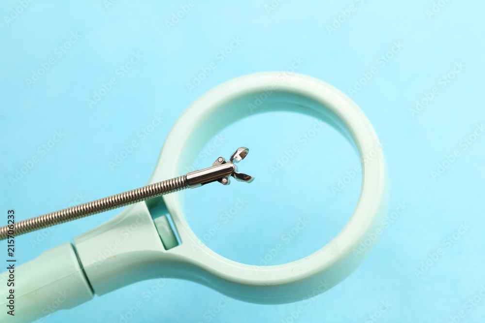 flexible endoscopy forceps, oval cup coated in a blue background Stock ...