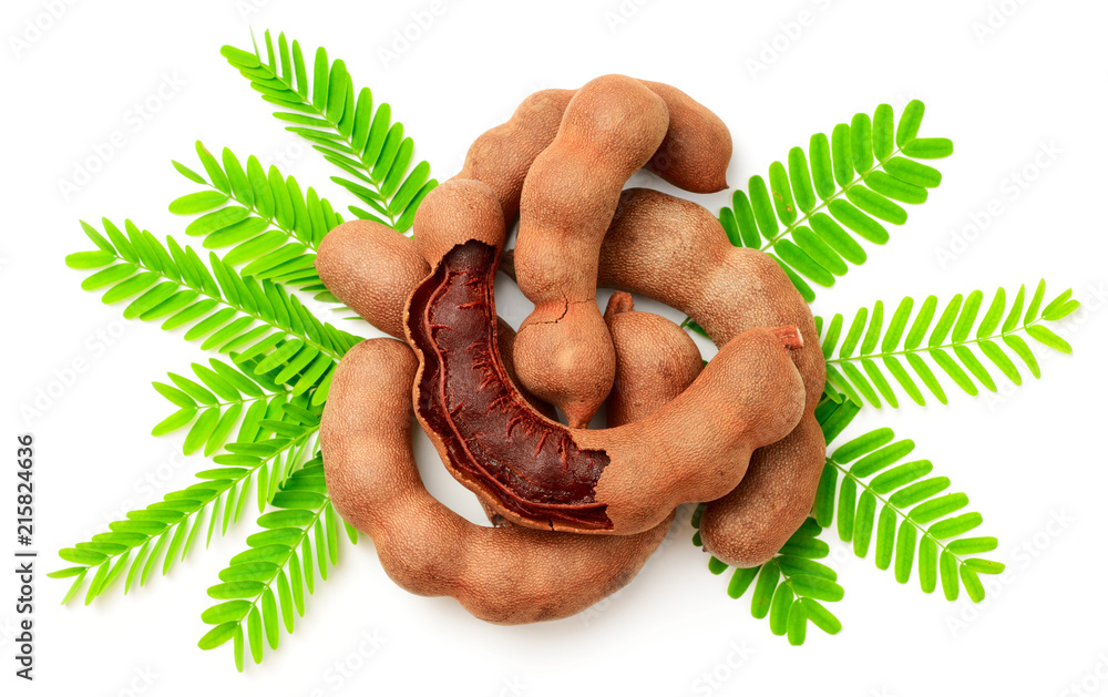 fresh tamarind fruits and leaves isolated on the white background Stock ...