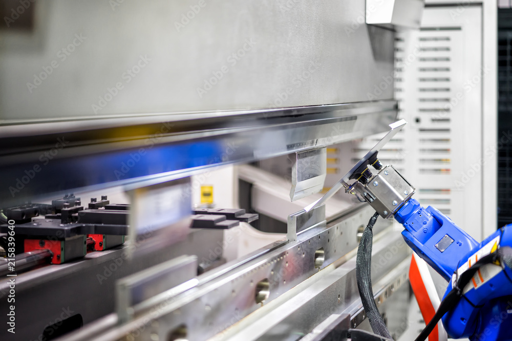 Hand robot working automatic cutting and bending metal sheet by high ...