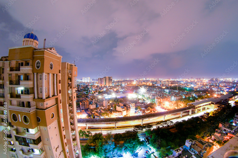 Night aerial cityscape of a modern indian city with skyscrapers ...