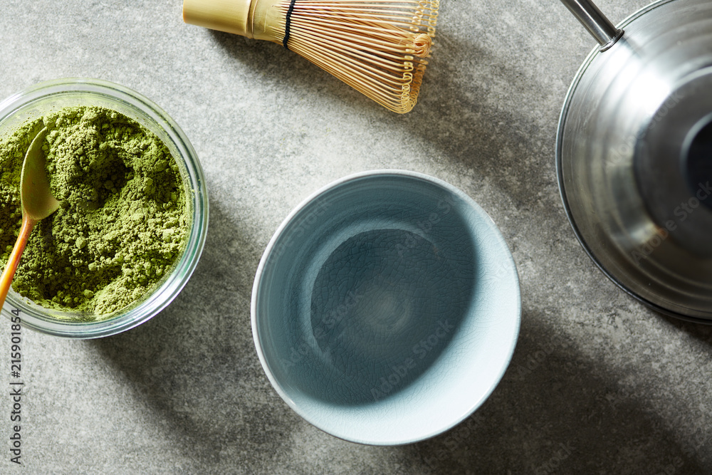 Bowls with green matcha tea and utensils for preparing tea. Stock Photo ...
