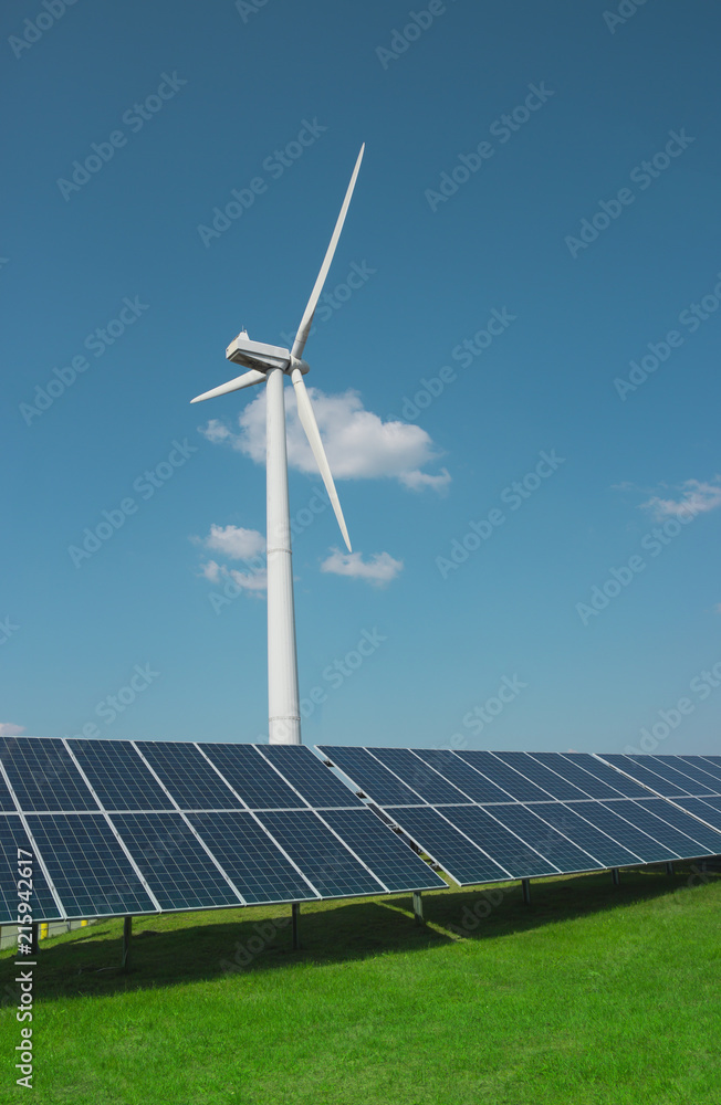 wind generator of electricity from three blades and solar panels of a ...
