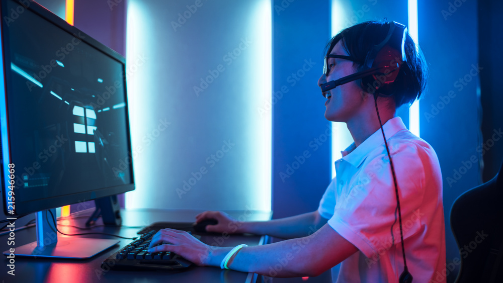 Side View Shot of Professional Gamer Playing in First-Person Shooter ...