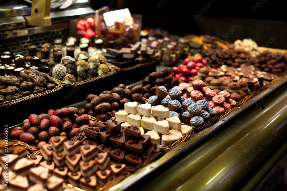 Famous sweet candy market .Confectionery at Boqueria market place in ...