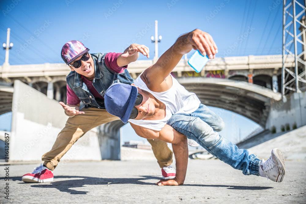 Breakdancers taking a selfie Stock Photo | Adobe Stock