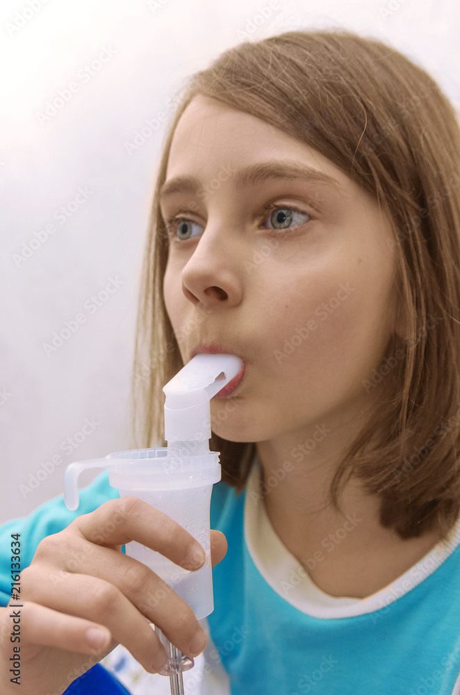 Child using inhaler. Theme of treatment of children's respiratory ...