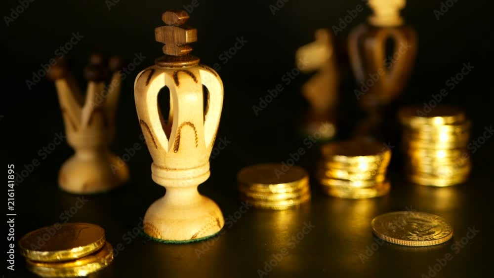 Chess and stack of coins in concept of money power or saving money ...