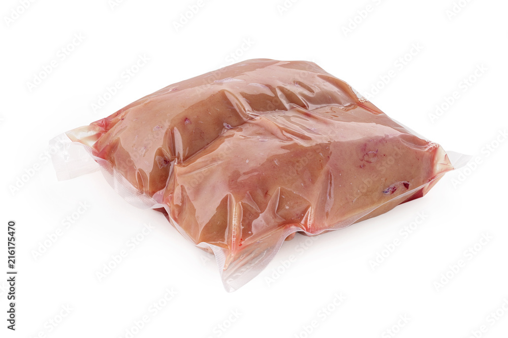 Raw bovine eggs bull testicles in a vacuum package on a white ...