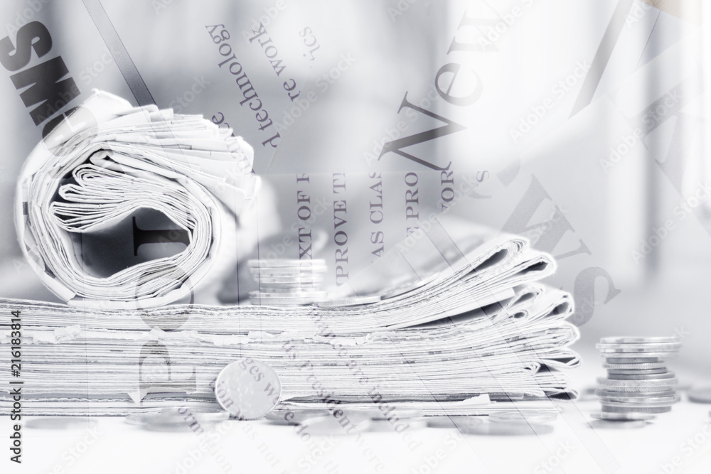 Newspaper background. Pile of papers with news and lots of coins ...