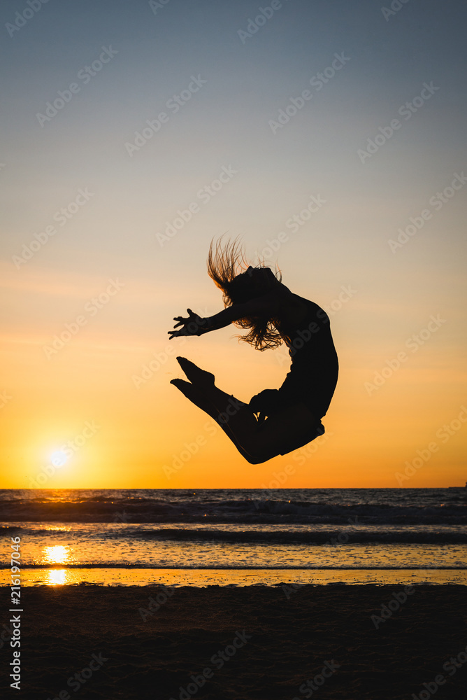 Jumping Silhouette Sunset