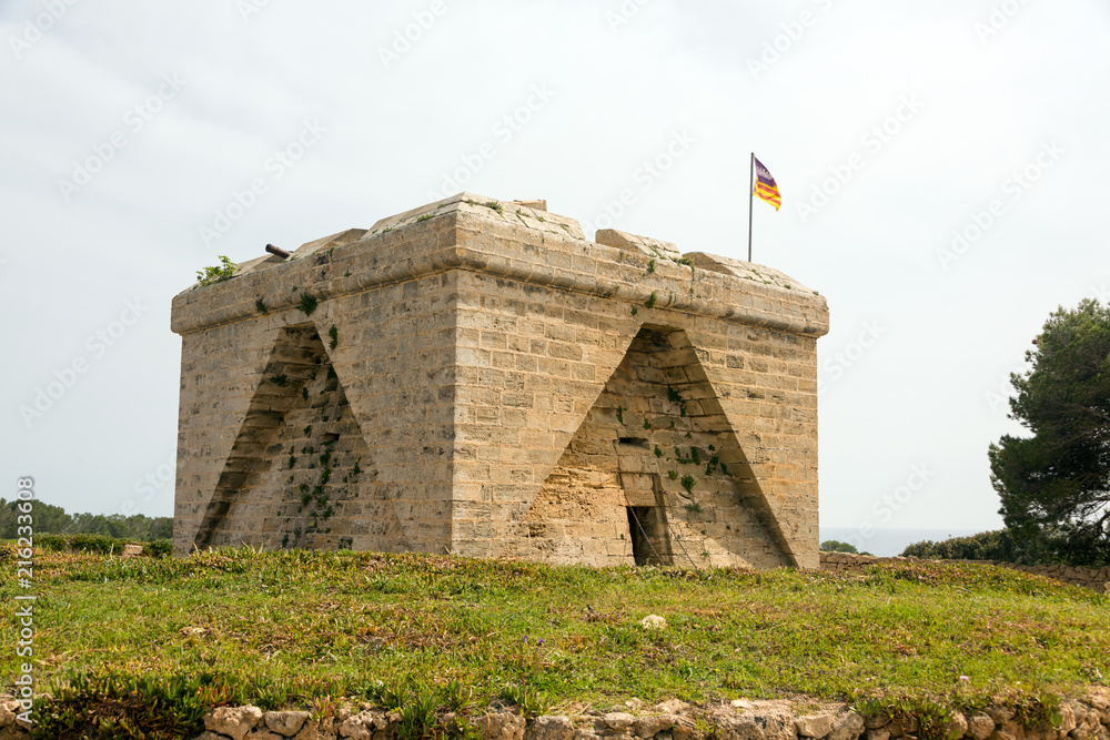 The old defence tower of Punta de N'Amer from the time of the Spanish ...