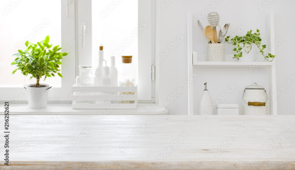 Empty table board and defocused modern kitchen window background ...