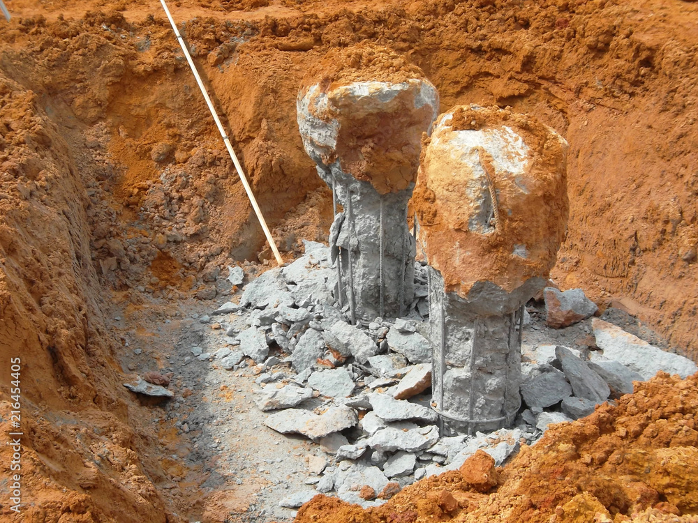 Bore pile cut to level by the construction workers. It will continue by ...