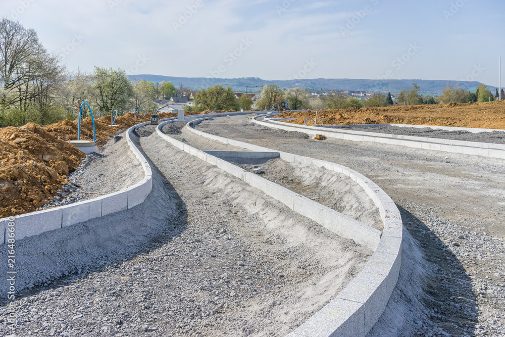 Baustelle im Strassenbau für ein Neubaugebiet Stock-Foto | Adobe Stock