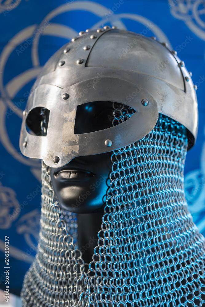 berserker, helmet of viking warrior with mail on coat of arms with ...