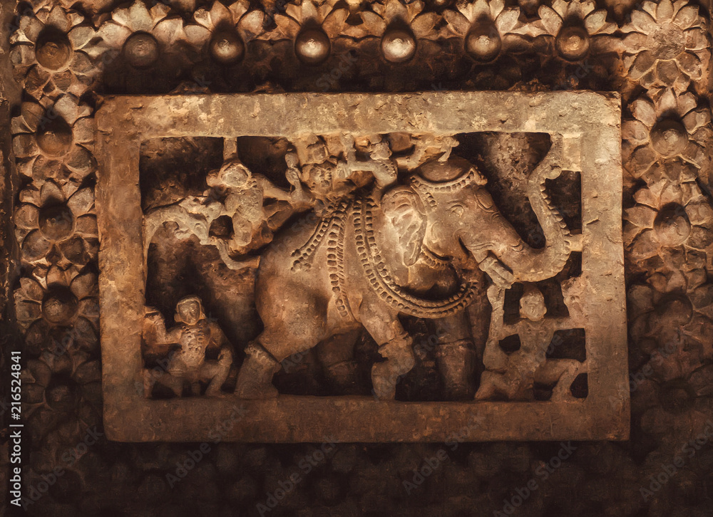 Elephant and monkies on ceiling of historical stone Hindu temple ...