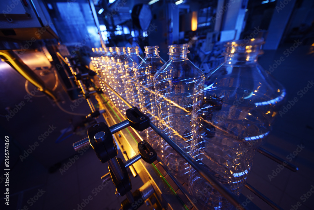 conveyor line for the production of plastic bottles close-up Stock ...
