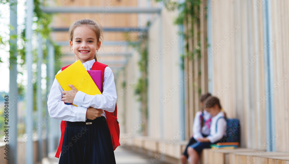 child girl schoolgirl elementary school student Stock Photo | Adobe Stock