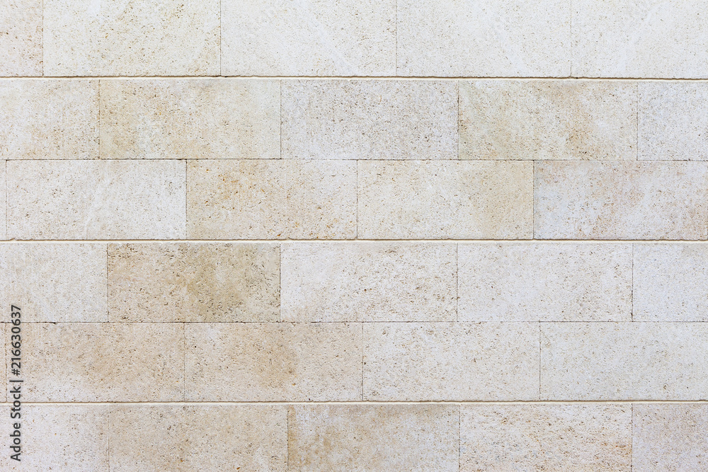 Texture of white stone. Accurate masonry of white sandstone. Brick wall ...