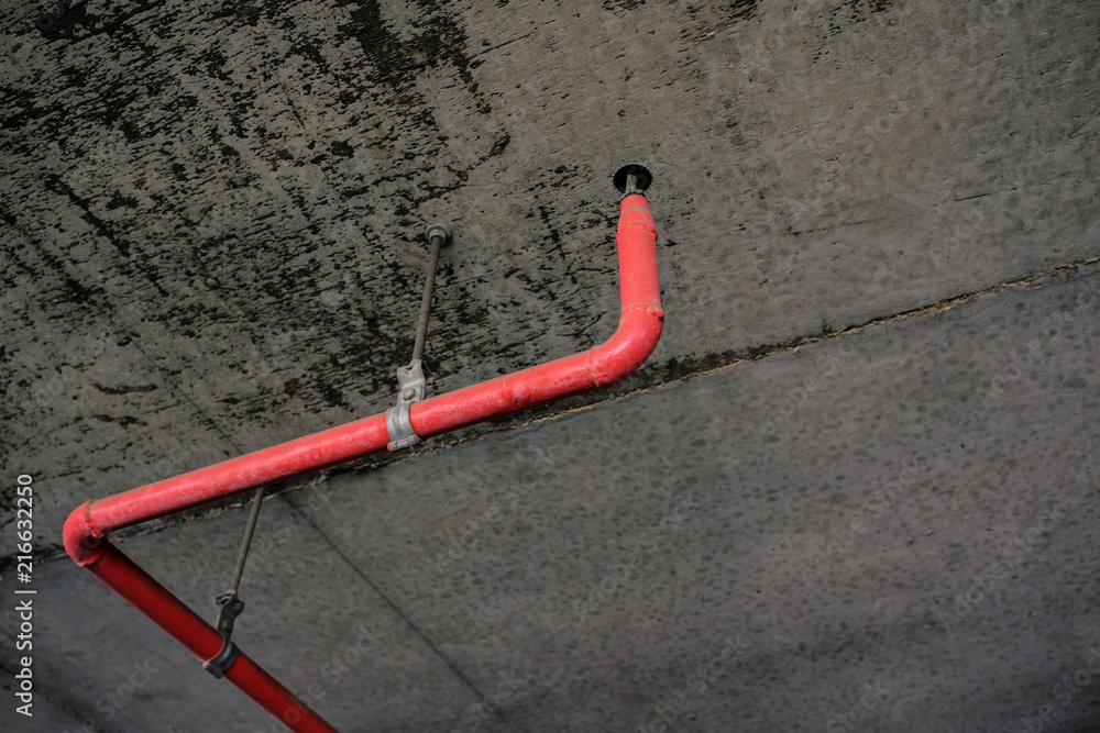 fire sprinkler or fire extinguishing system under ceiling of building ...